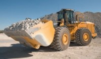 Deere enters seven-yard loader class with 844J