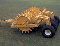 Low cost, towed compaction roller comes in two widths