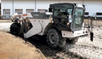 Soil stabilizer and reclaimer works to 20-inch depth