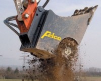 Bucket features attached milling unit