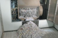 Single shaft paper grinder features adjustable screen