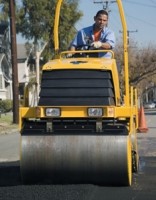 Tandem and combination vibratory rollers