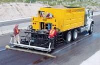 Slurry seal/microsurfacing paver