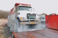 Above ground, portable wheel wash system