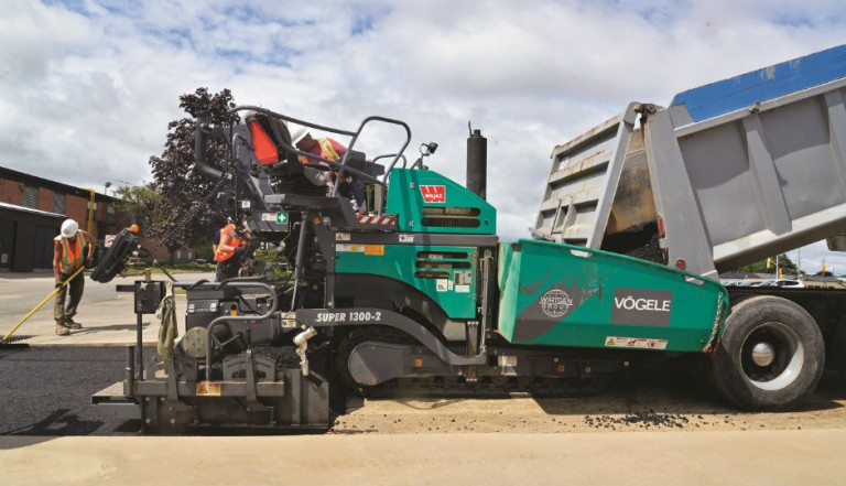 Mid-size paver provides stability of a large machine and ...