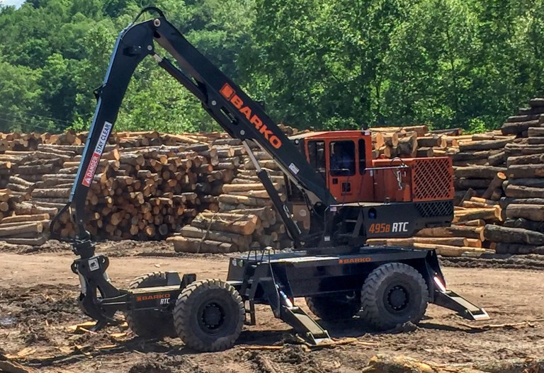 Log loader handles rough terrain with more power and maneuverability