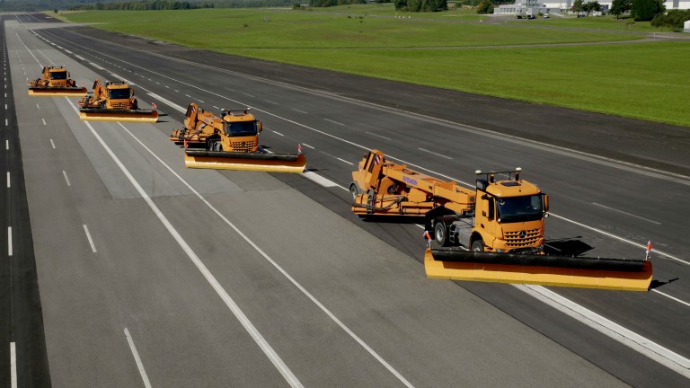 Automated Mercedes-Benz trucks take on airfield snow clearing in test ...