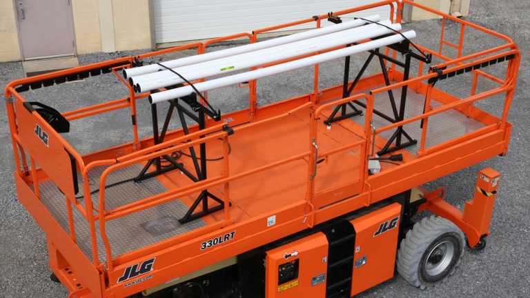 JLG introduces large material racks for scissor lifts