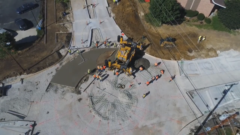 Watch a GOMACO GP3 slipform paver pave Iowa roundabout