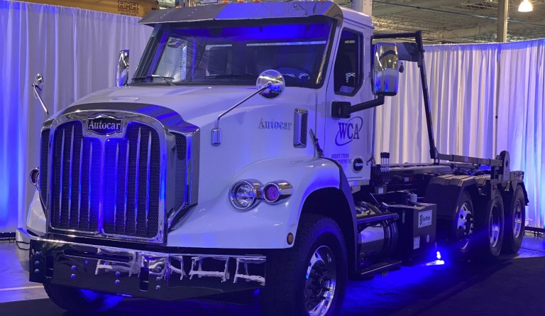 Autocar delivers first production model DC-64R conventional roll-off to ...