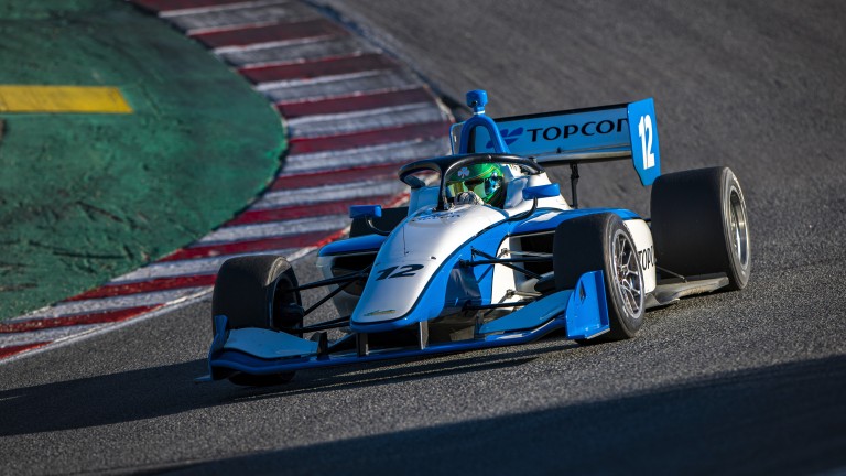 Topcon signs professional race car driver to an extension