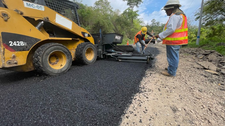 Mazio's new skid steer loader paving attachment