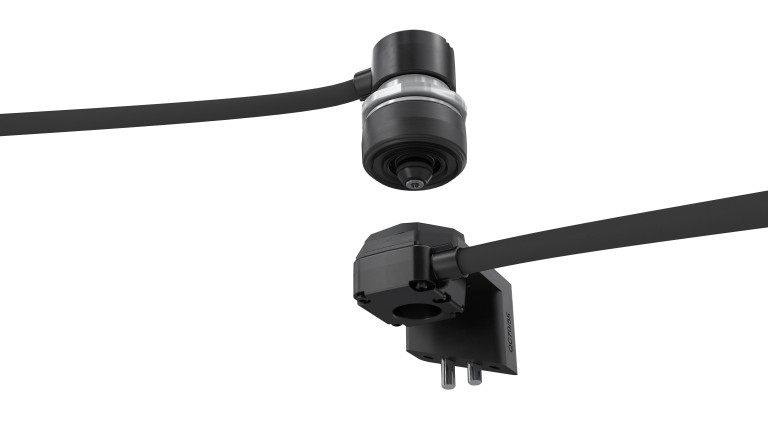 Electrical connector increases reliability of quick coupler system